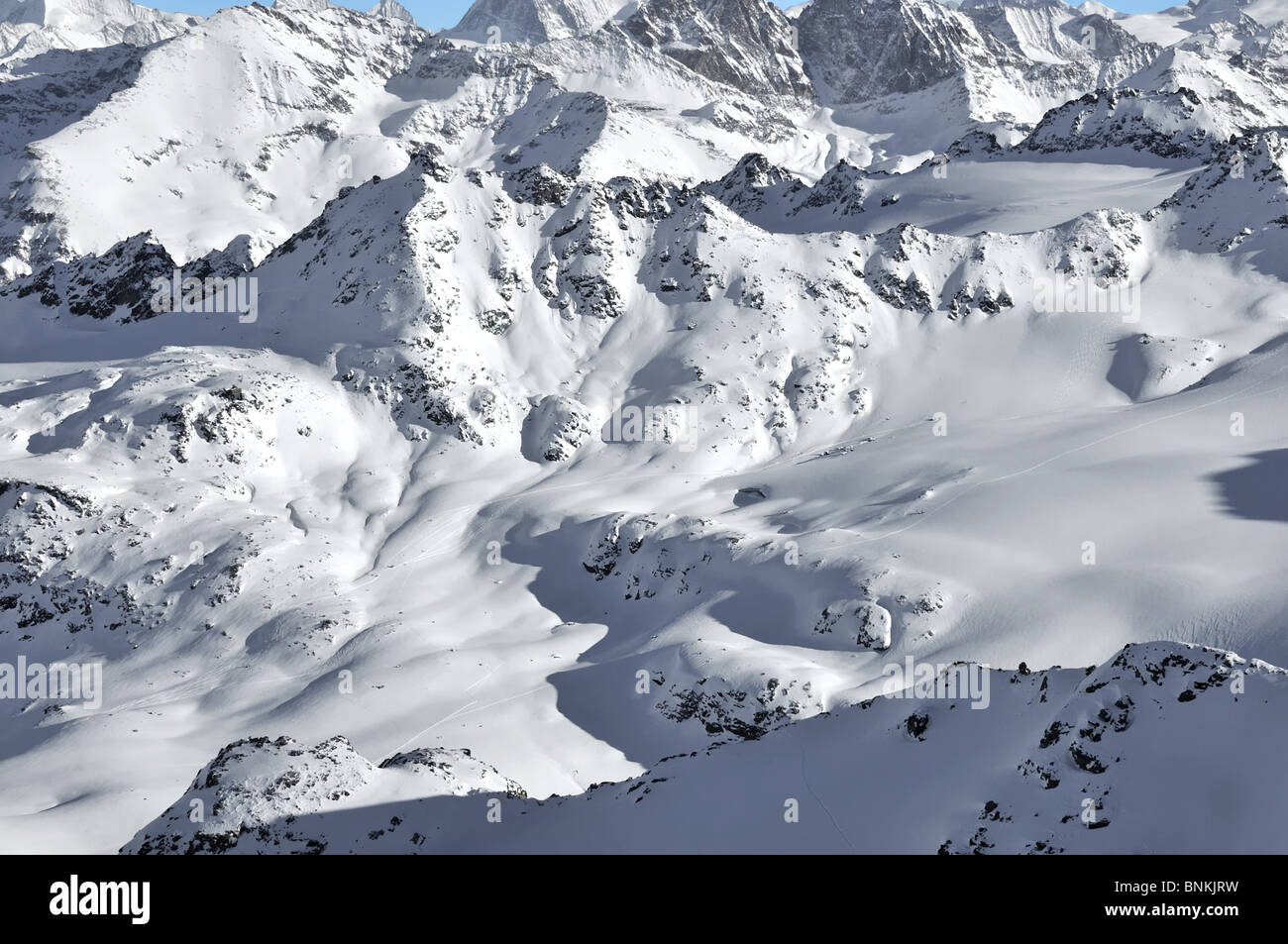 Winter Switzerland Valais Swiss snow burr rock cliff summit peak Alps ...