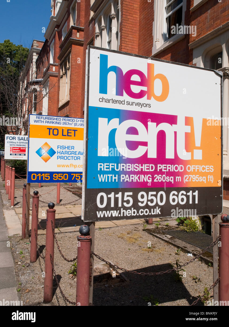 A line of For Sale and To Let Boards in Nottingham City Centre ...