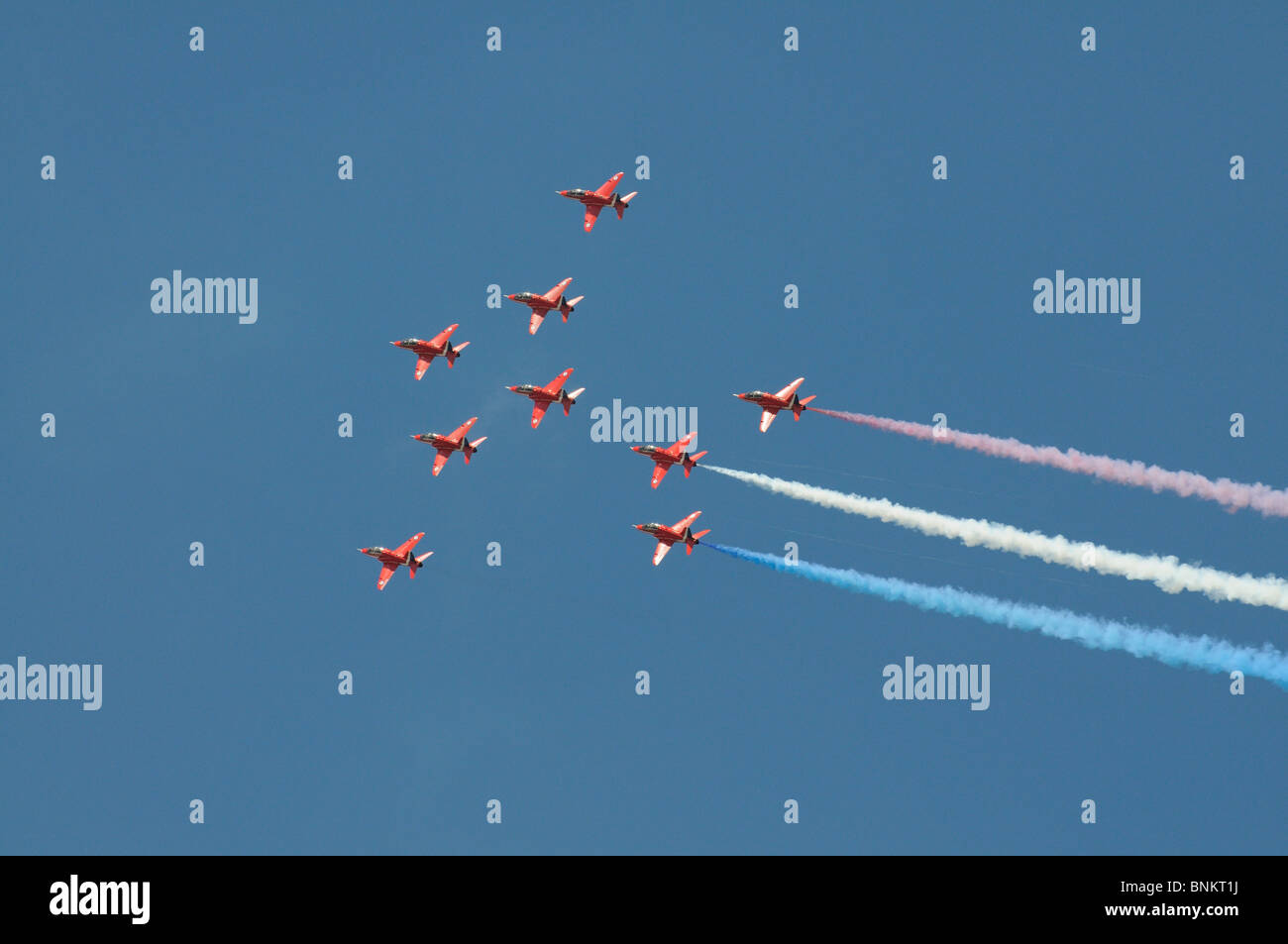 The Red Arrows RAF aerobatic display team flying their Hawk aircraft in ...
