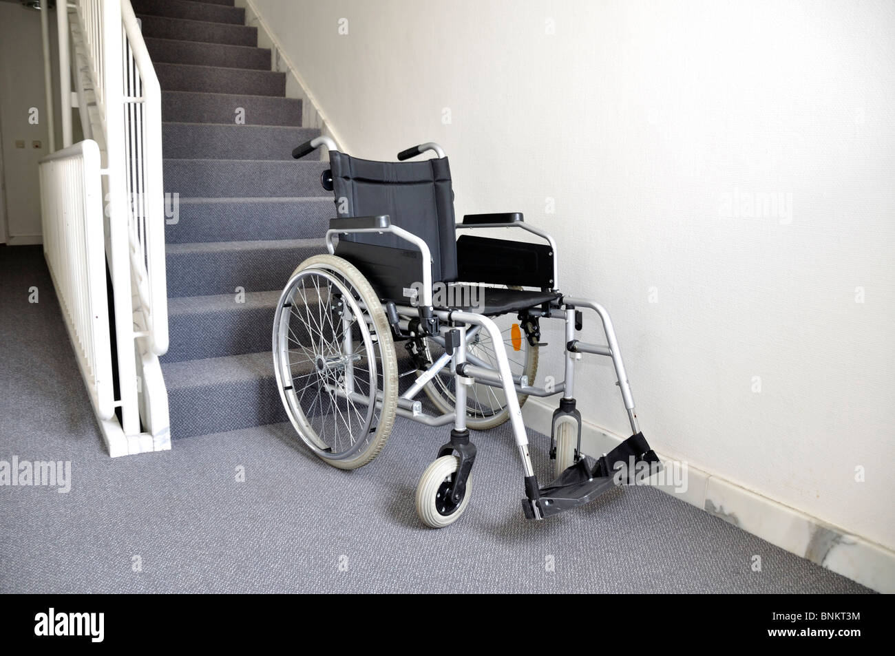 Wheel chair stairwell block ill blank stair hinders stand obstruct ...