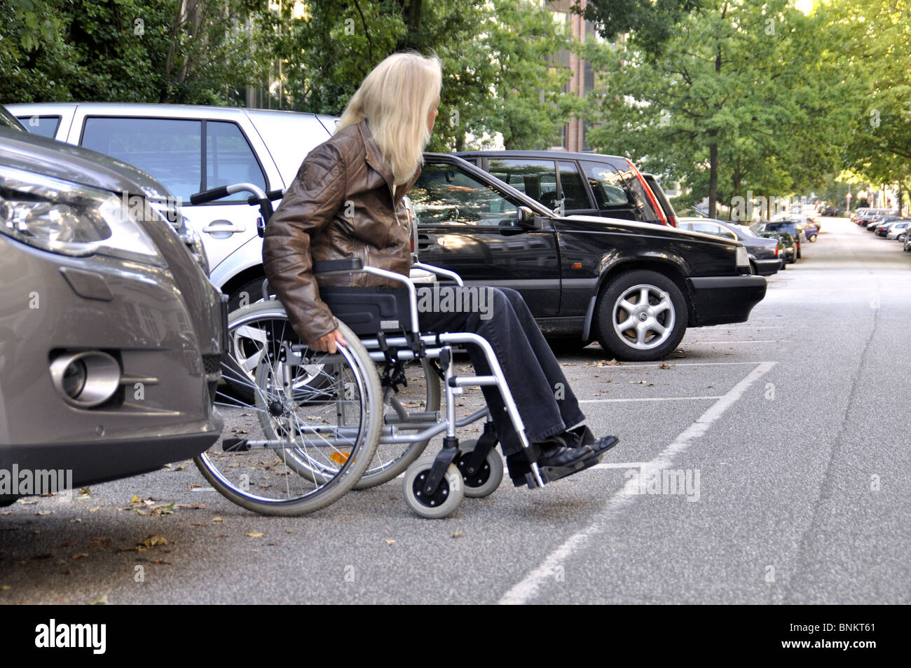 Woman Wife old boss senior citizen wheel chair walking impediment ...