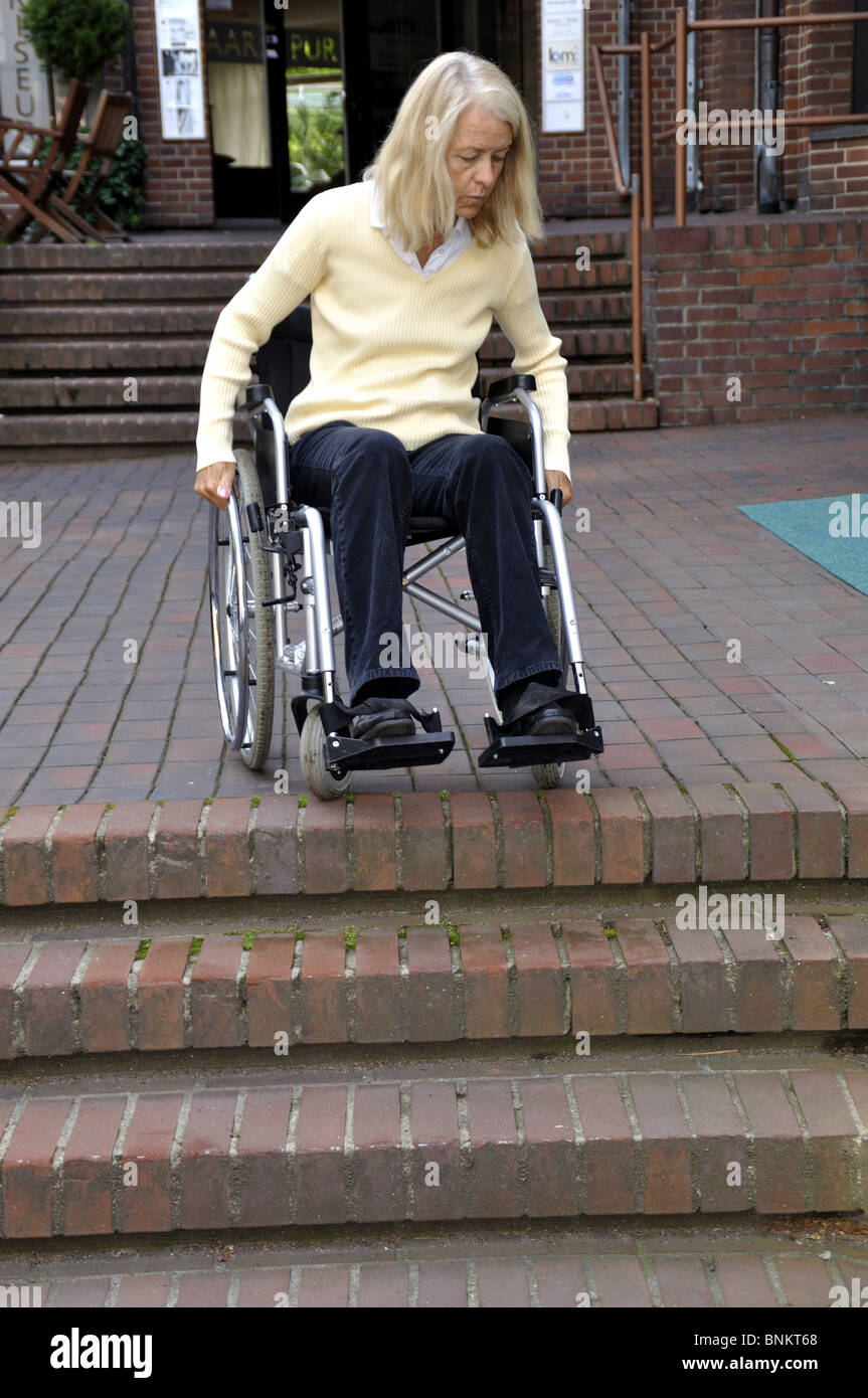 Woman Wife old boss senior citizen wheel chair walking impediment ...