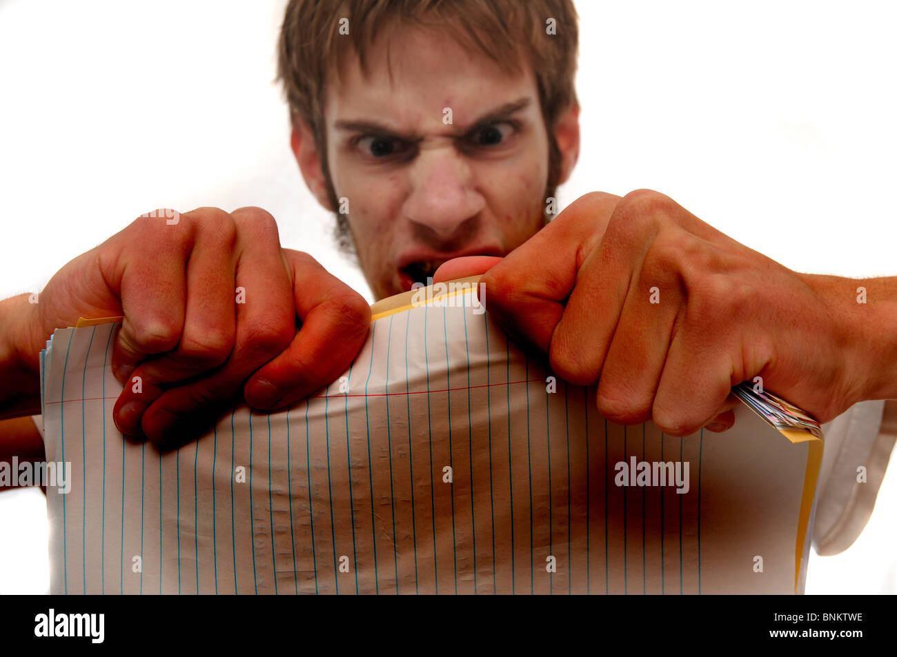 Man ripping paper hi-res stock photography and images - Alamy