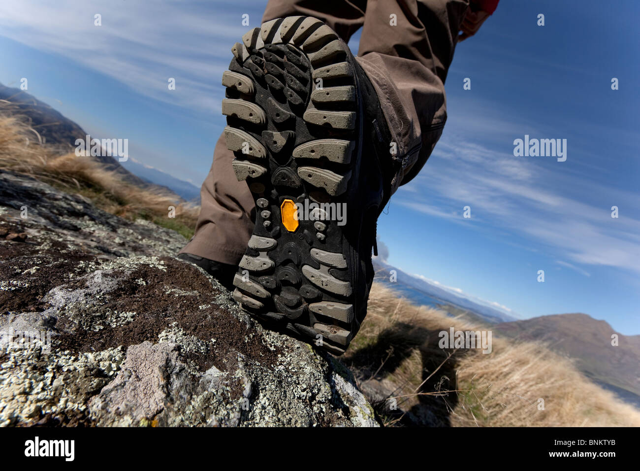 foot of a hiker view from below of his shoe and sole Stock Photo - Alamy