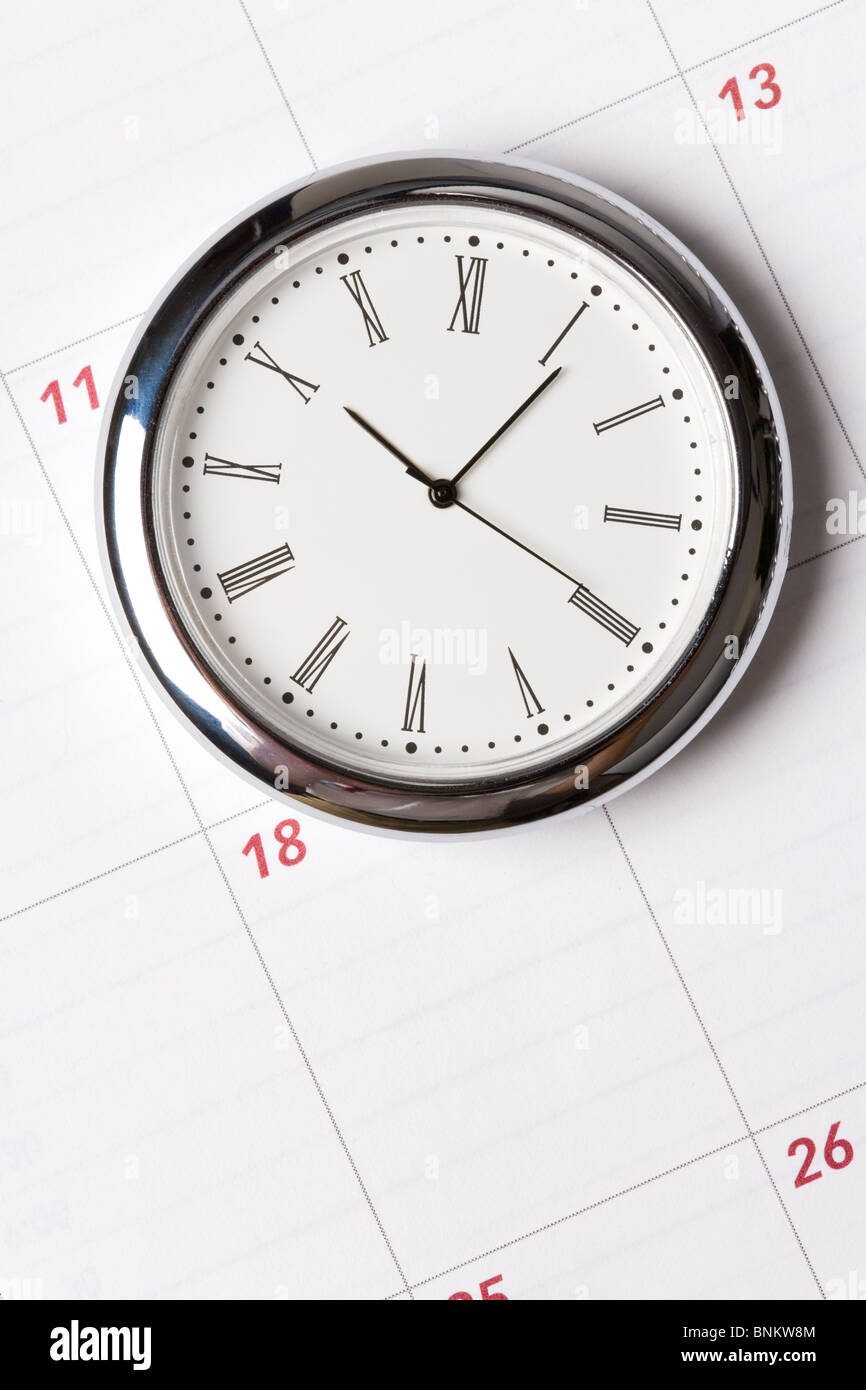 calendar and clock close up shot Stock Photo - Alamy