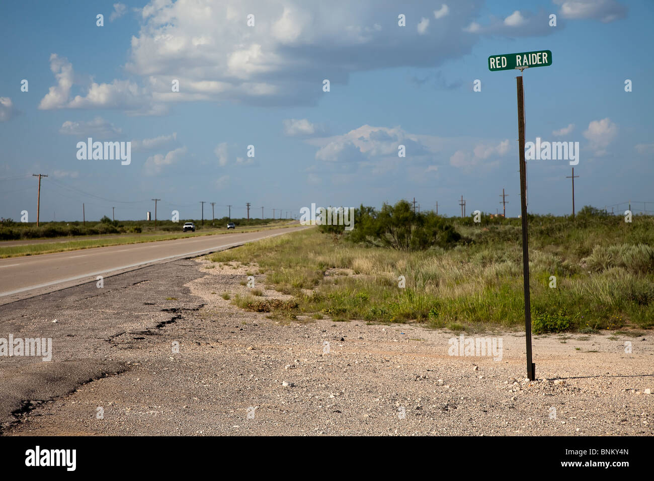 Red Raider dirt road sign at edge of highway Eunice Texas USA Stock ...