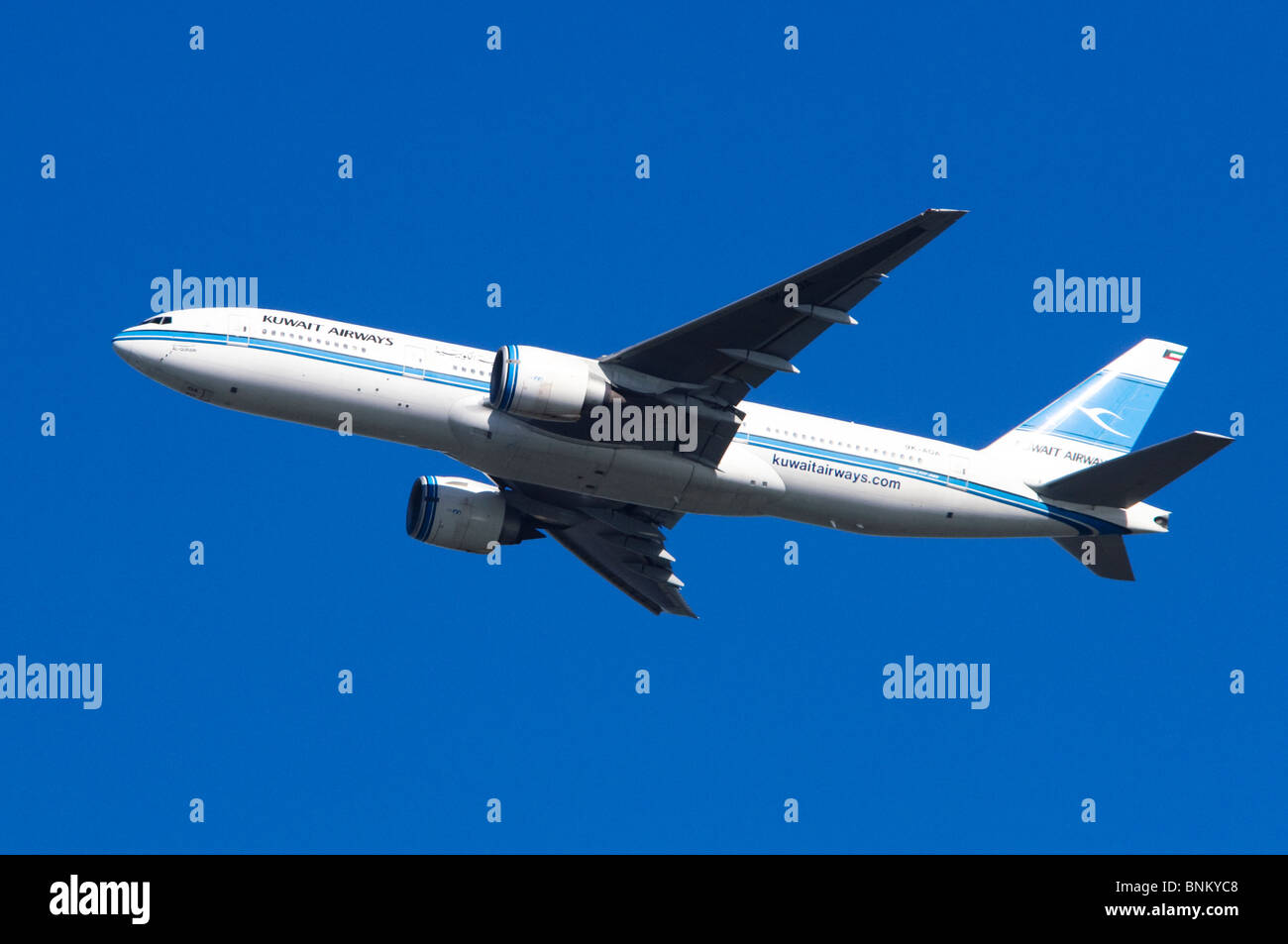 Boeing 777 operated by Kuwait Airways climbing out from take off at ...