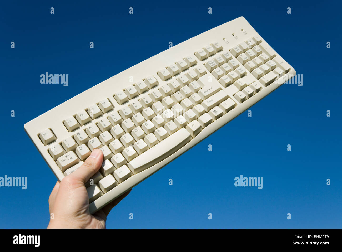Computer Keyboard and blue sky, concept of freedom Stock Photo - Alamy