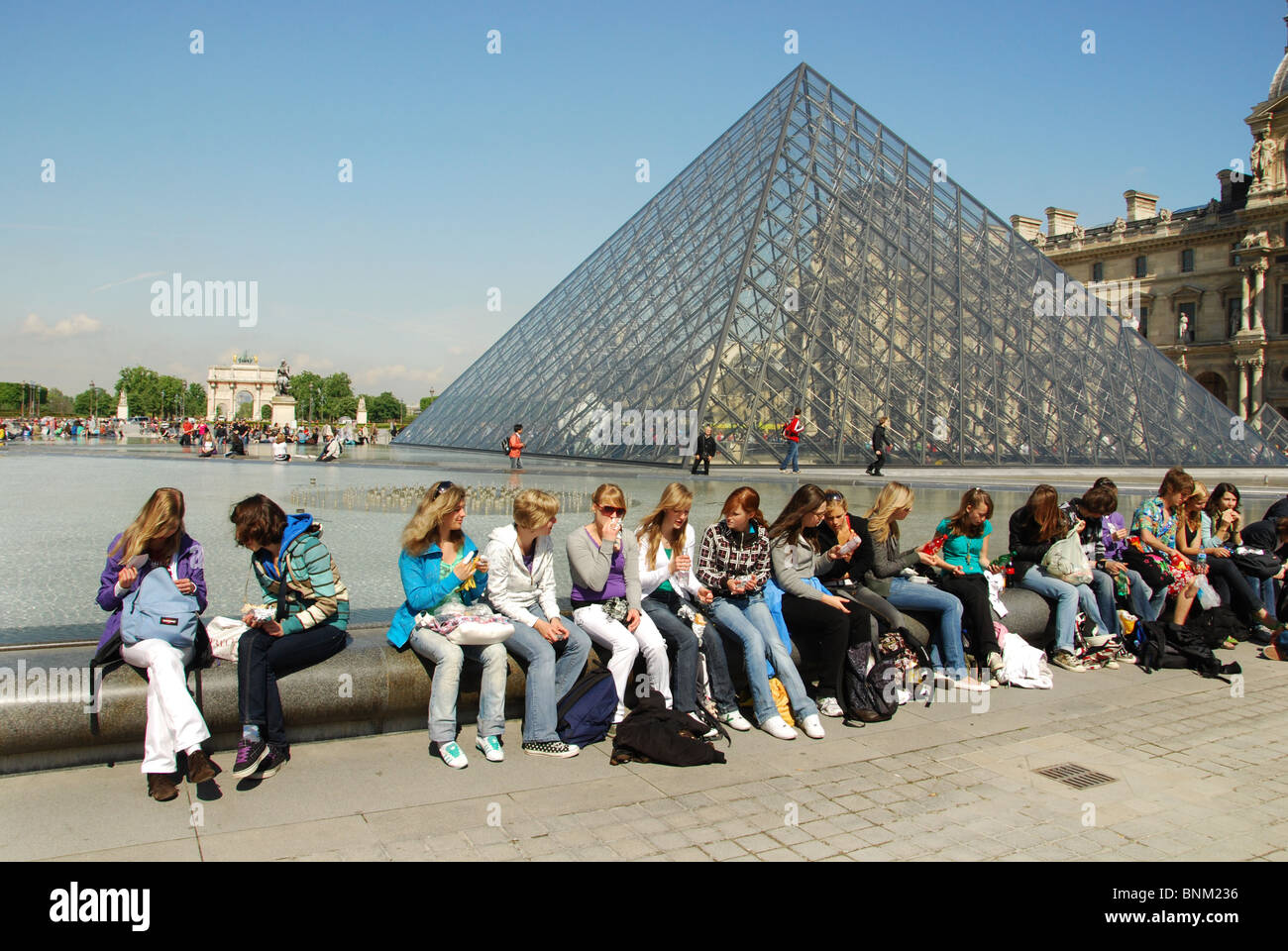 Louvre pyramid crowd hi-res stock photography and images - Alamy