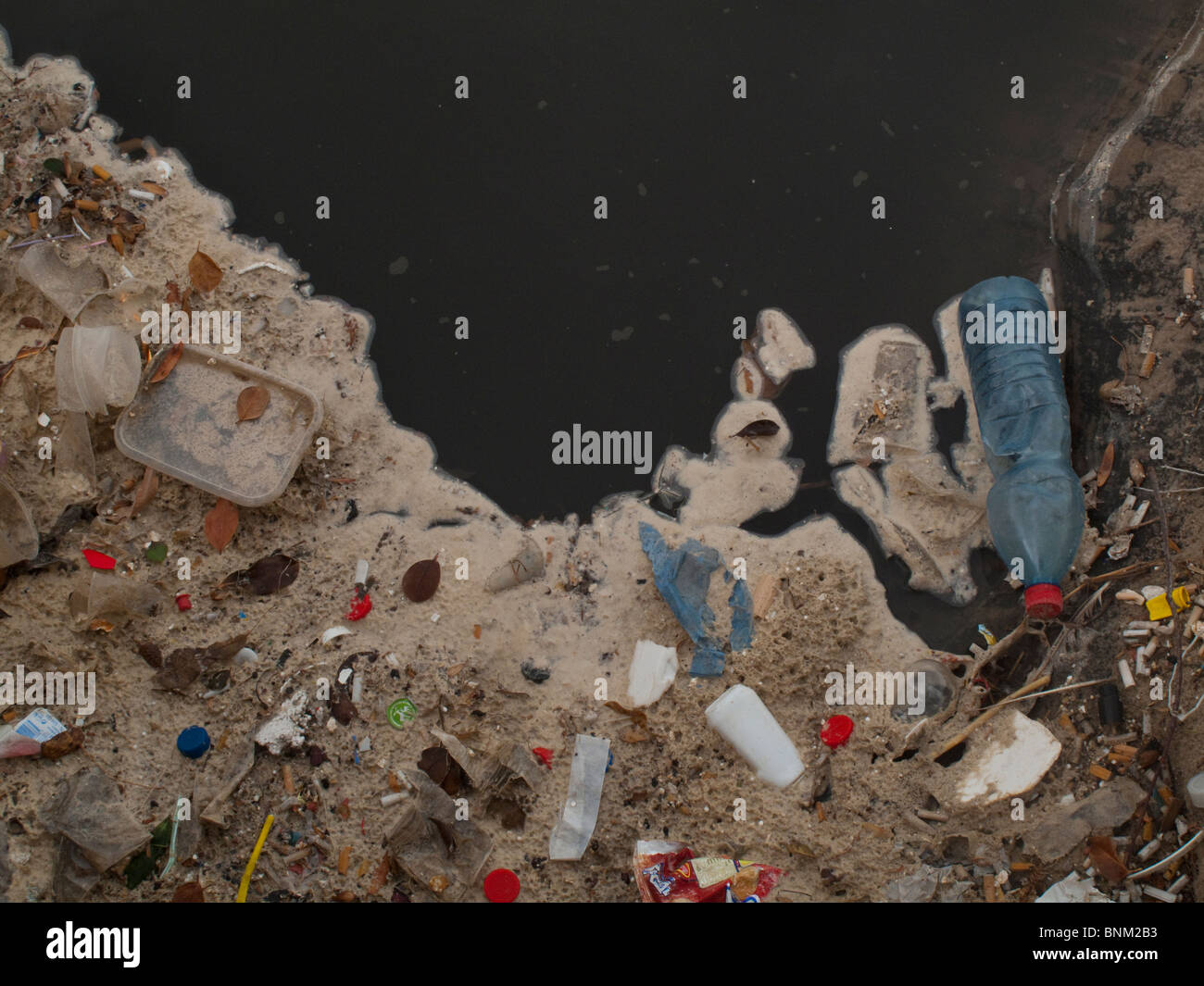 Beach pollution by plastic and trash Stock Photo - Alamy
