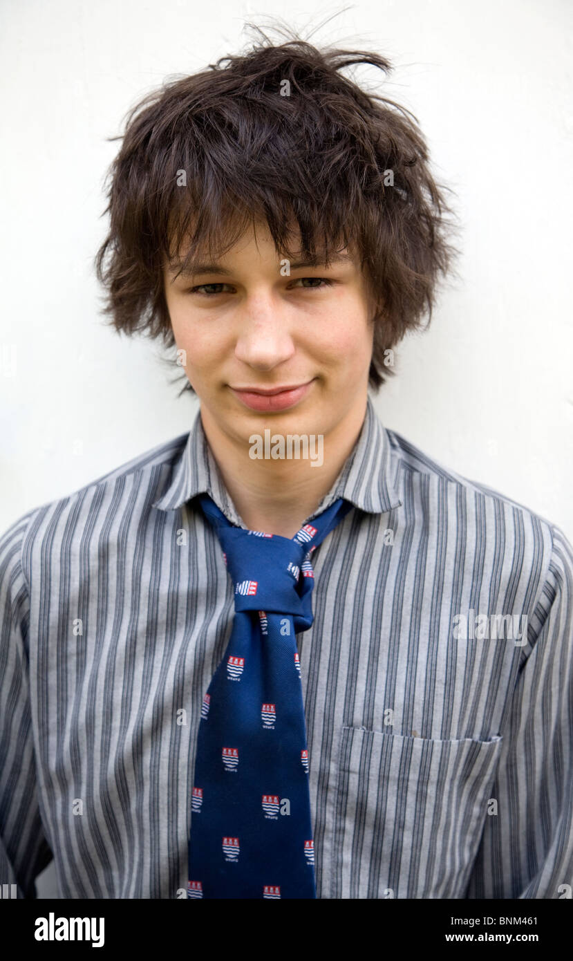 Teenage boy wearing tie and striped shirt Stock Photo - Alamy