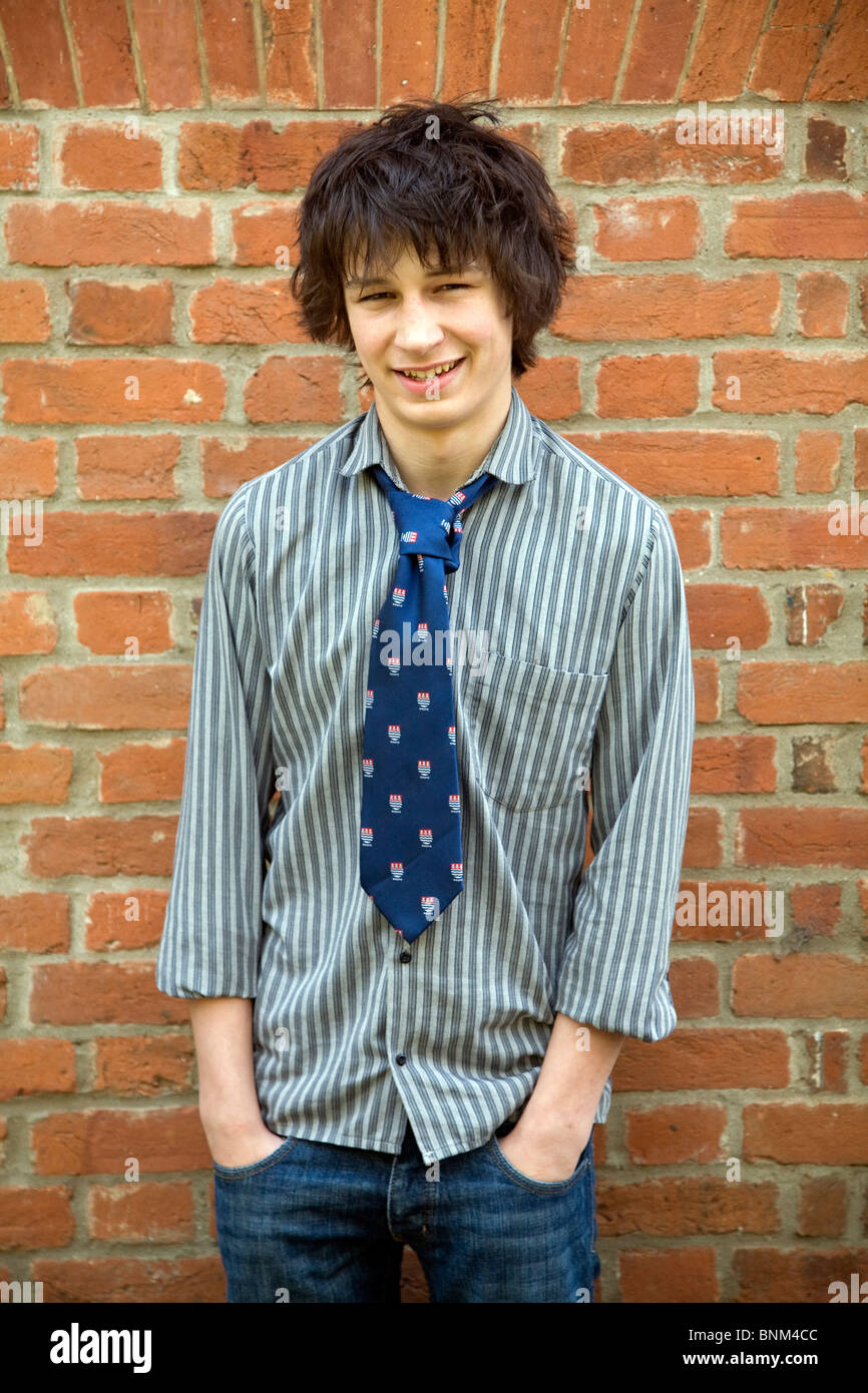 Teenage boy wearing tie and striped shirt Stock Photo - Alamy