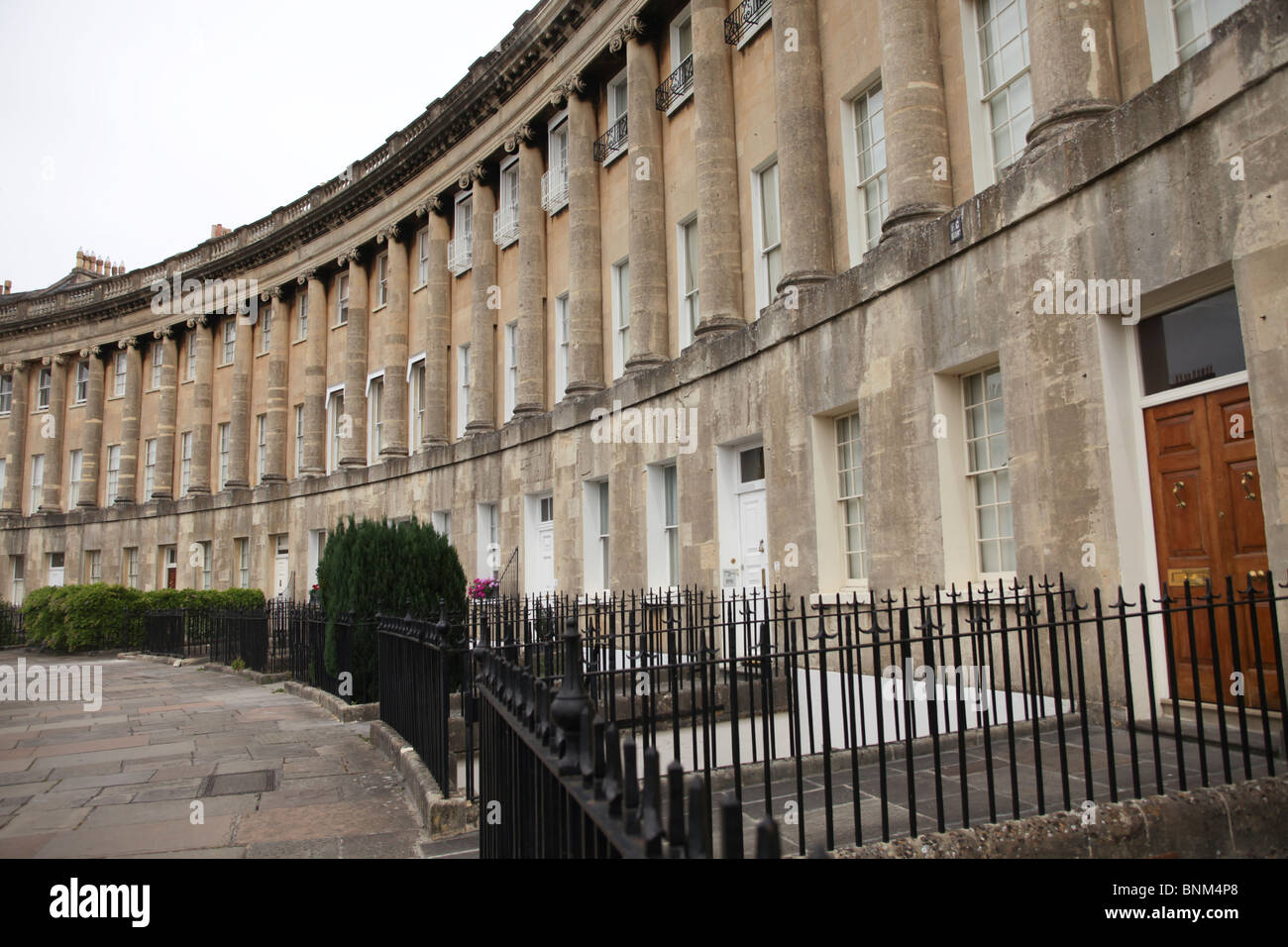 View on the royal crescent in Bath. Historic houses in a giant crescent ...