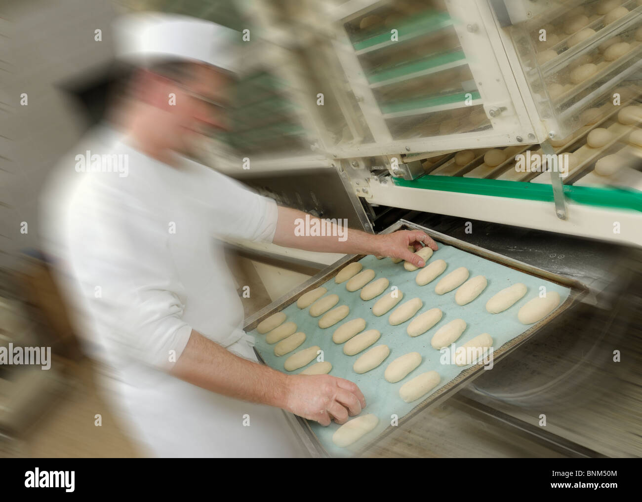 pastry process to bread, machine preparing pastry to bread rolls blanks ...