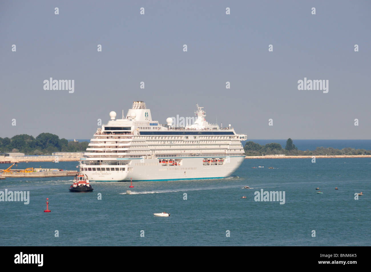 Crystal Cruises MV Crystal Serenity navigating lagoon on departure from ...
