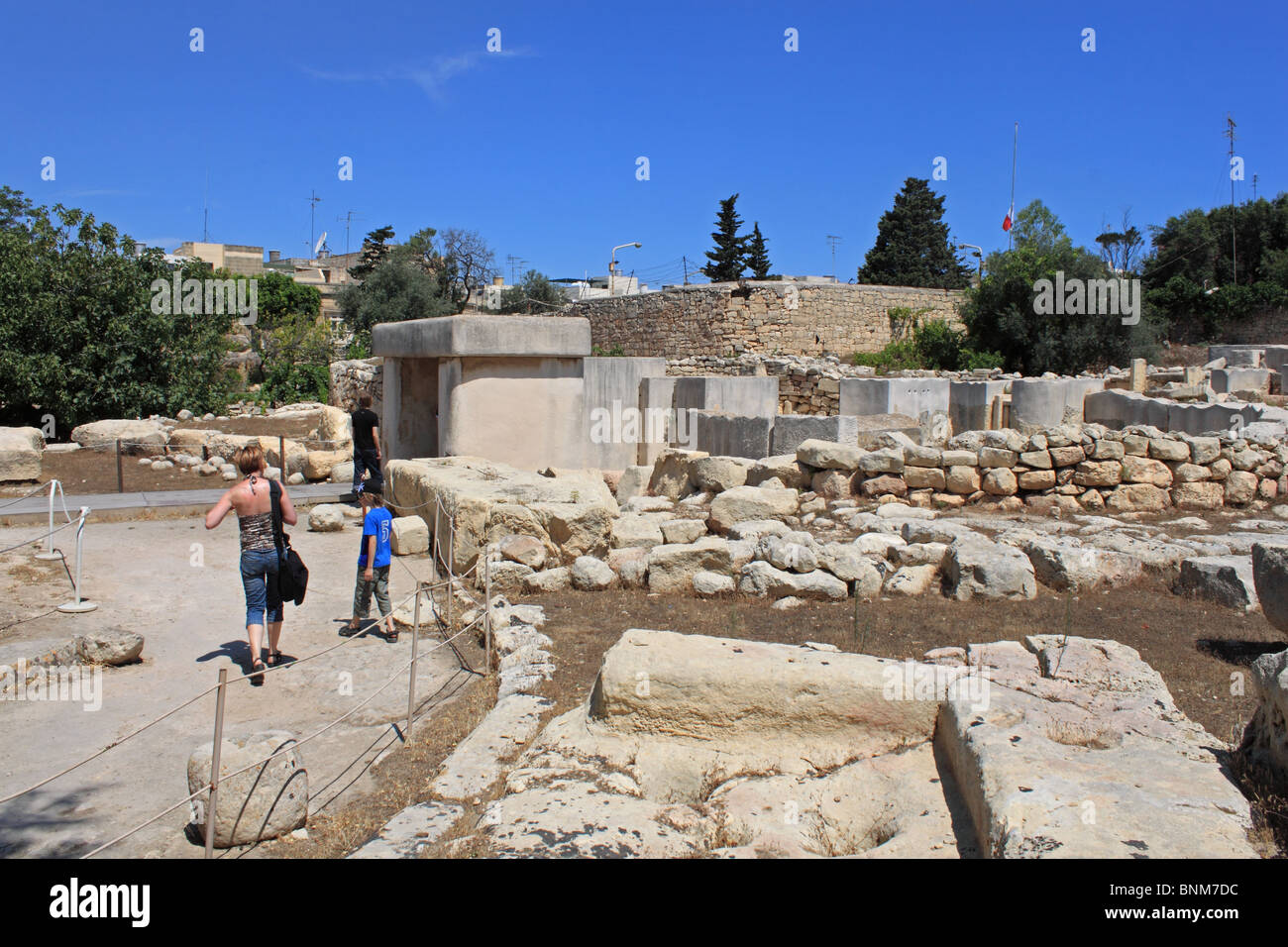 Family visiting the neolithic South Temple (3000-2500BC), Tarxien ...