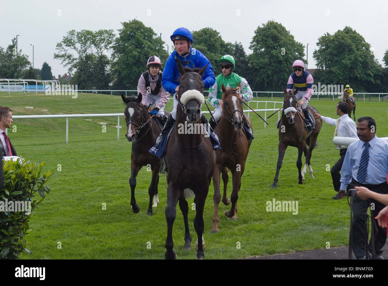 Horses and Jockeys leaving leaving the track at Doncaster Racecourse ...