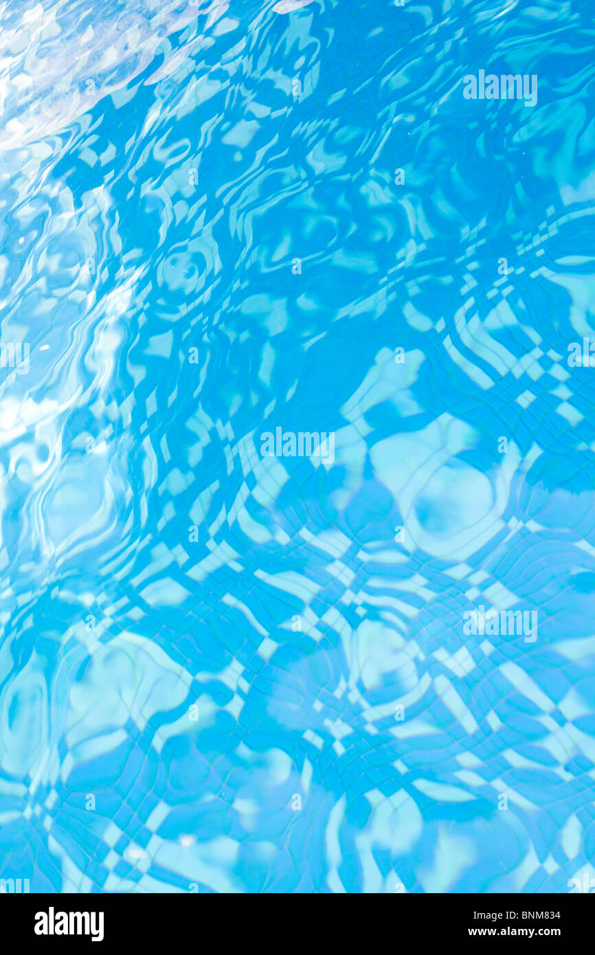 Waves on a surface of water in pool Stock Photo - Alamy