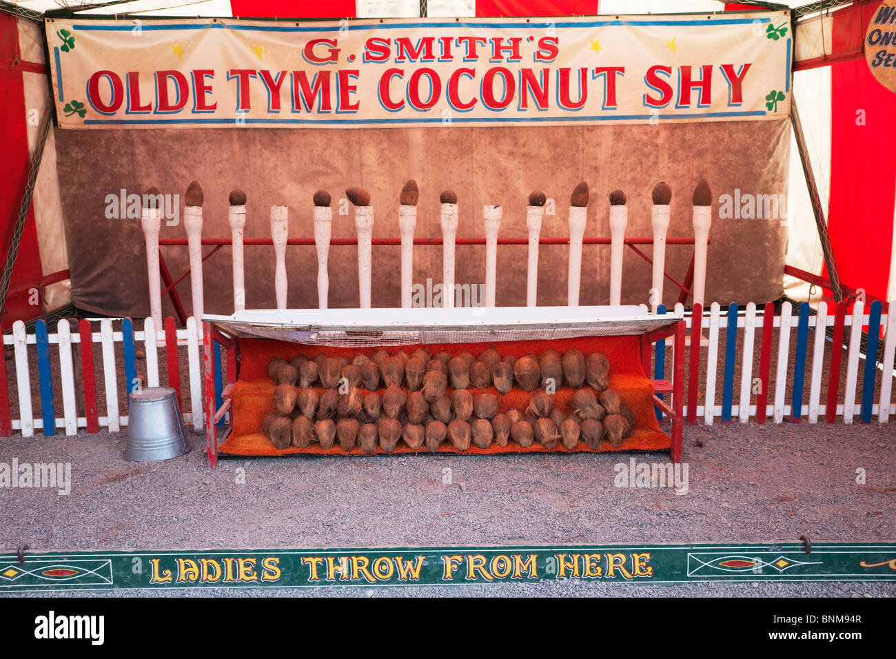 Fairground coconut shy hi-res stock photography and images - Alamy