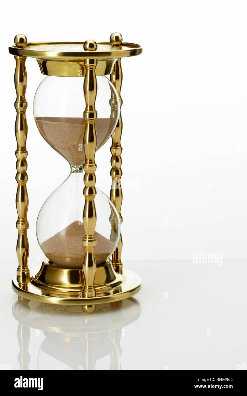 Old fashioned brass hourglass hi-res stock photography and images - Alamy