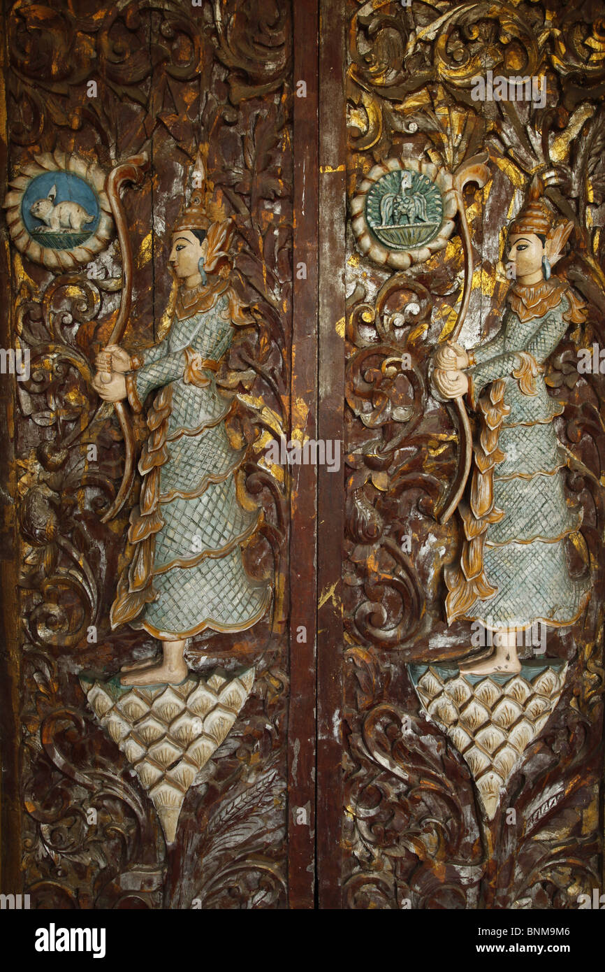 Myanmar Burma Burma door wooden carving figures detail close-up craft ...