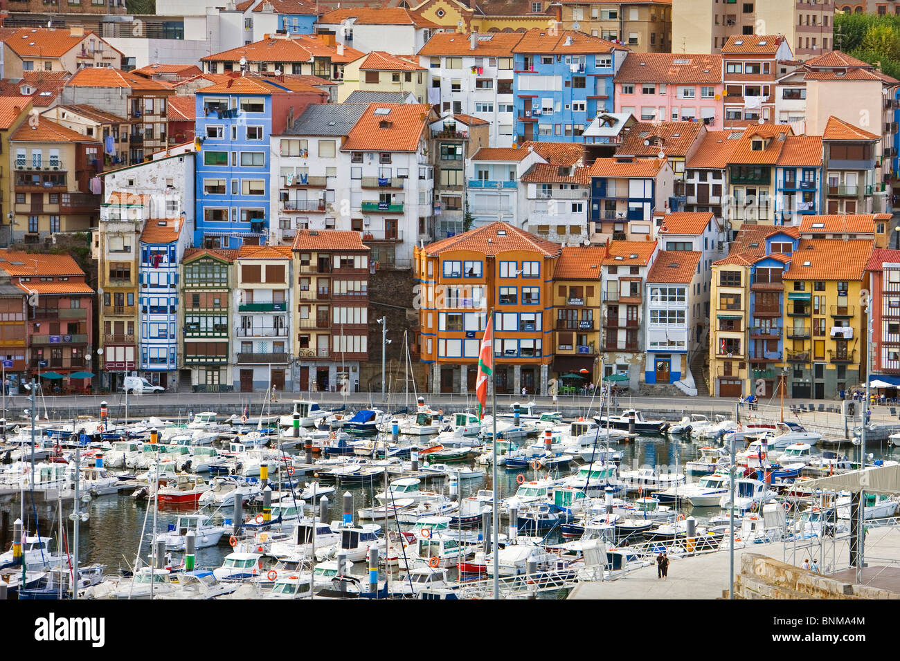 Spain Basque Provinces Bermeo harbour port village boats houses homes ...