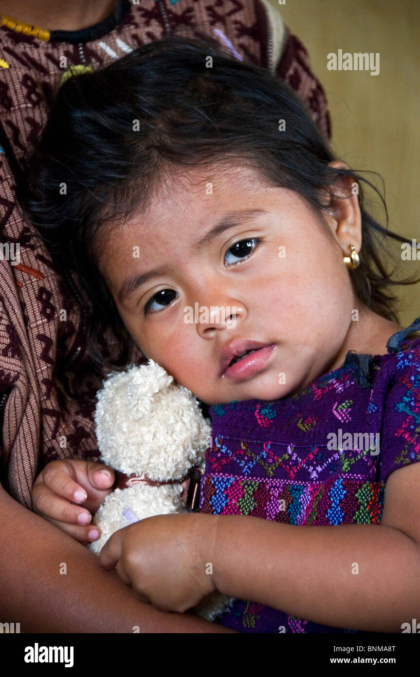 Mayan Child in the arms of her mother Guatemala Stock Photo - Alamy
