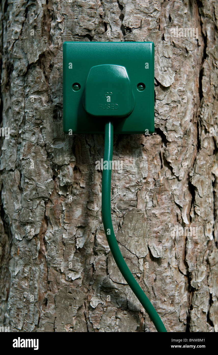 Green electric saving plug in hi-res stock photography and images - Alamy
