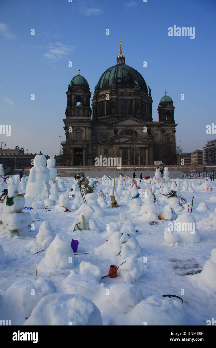 Germany winter Berlin snow cathedral dome snowmen figures Stock Photo ...