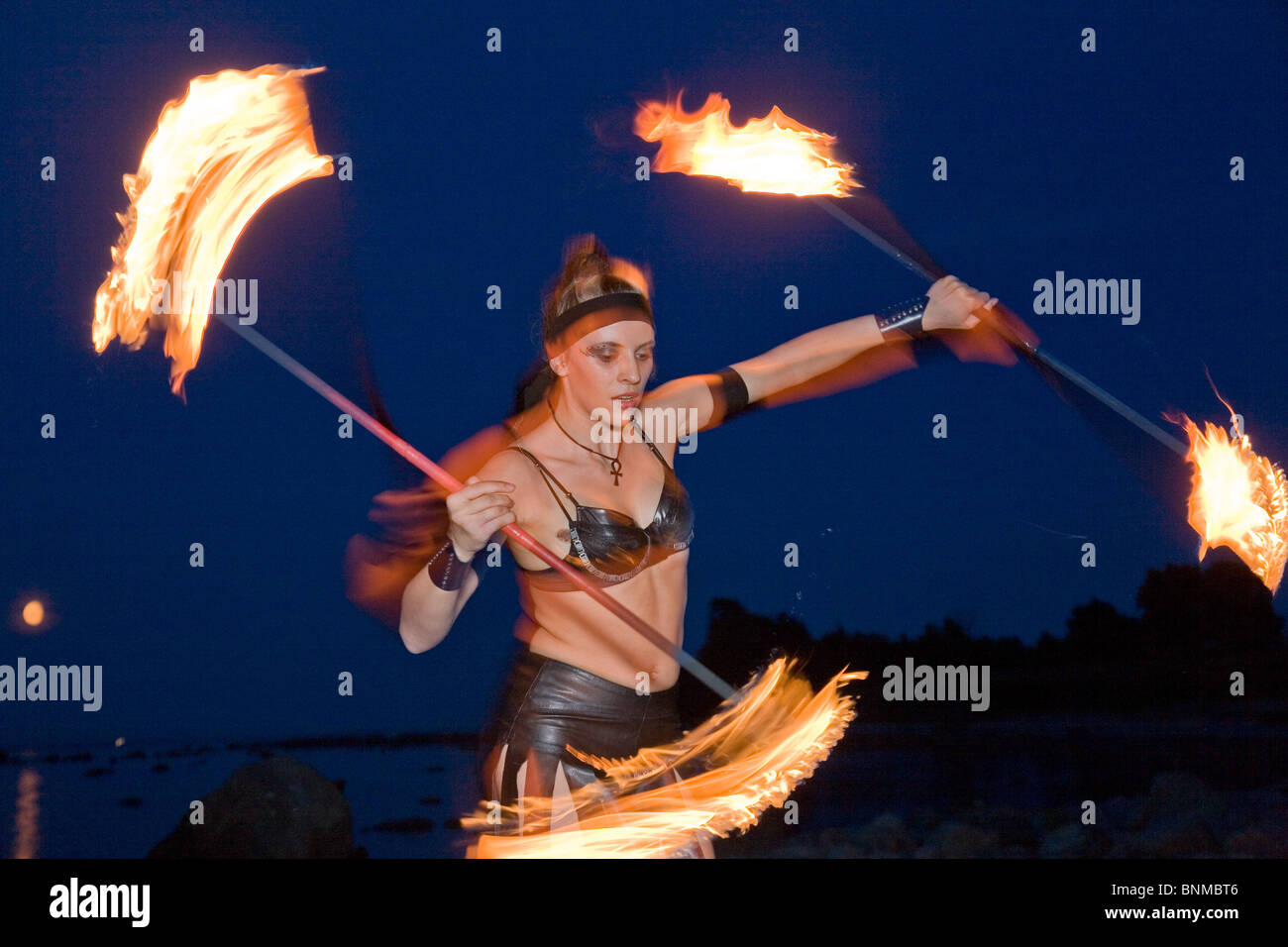 Fire twirler hi-res stock photography and images - Alamy