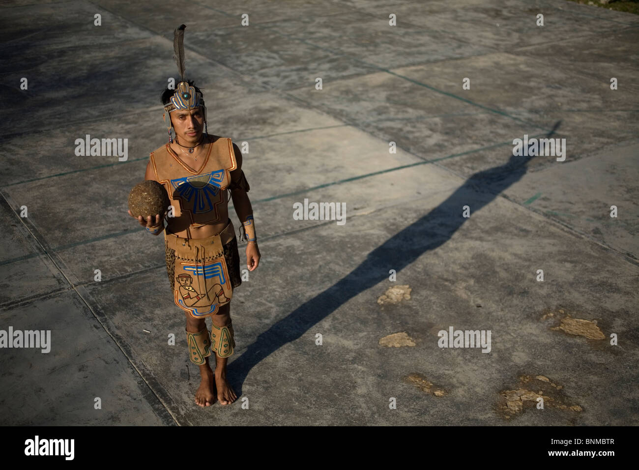 A player poses for a portrait before a match of the Mayan Ball Game ...