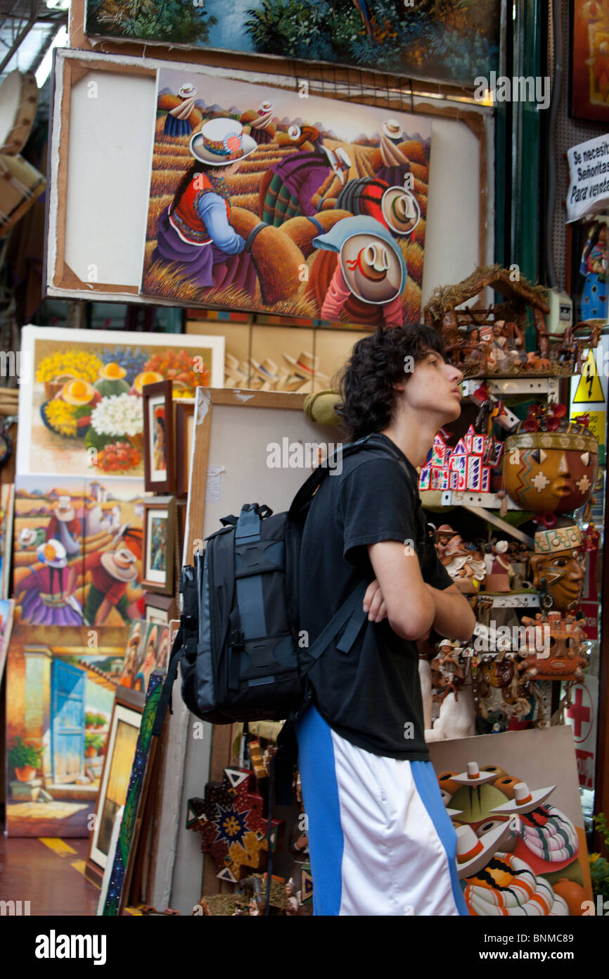 Tourist looking at Peruvian goods in a Lima, Peru Market Stock Photo ...