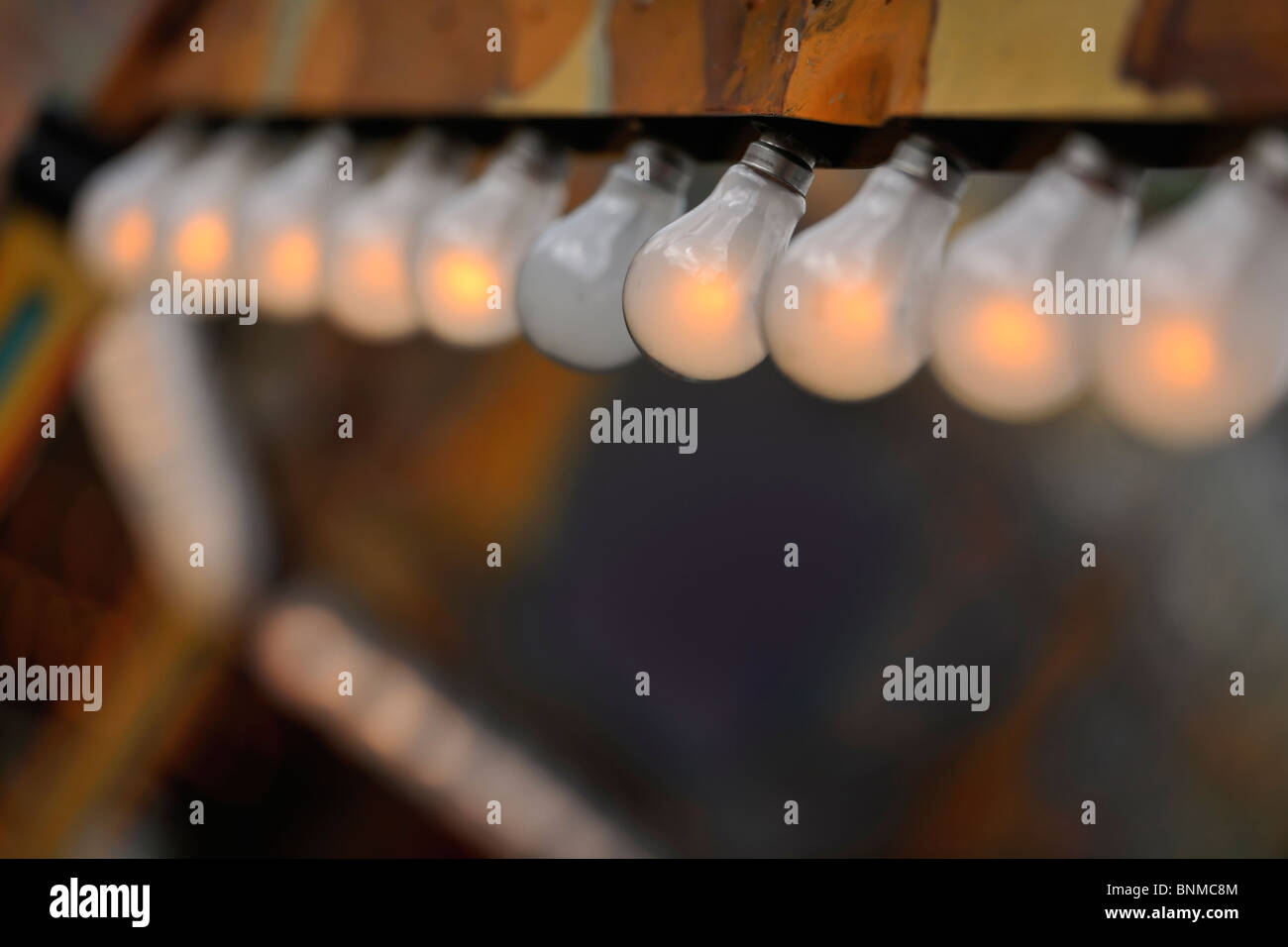 A row of electric light bulbs Stock Photo - Alamy