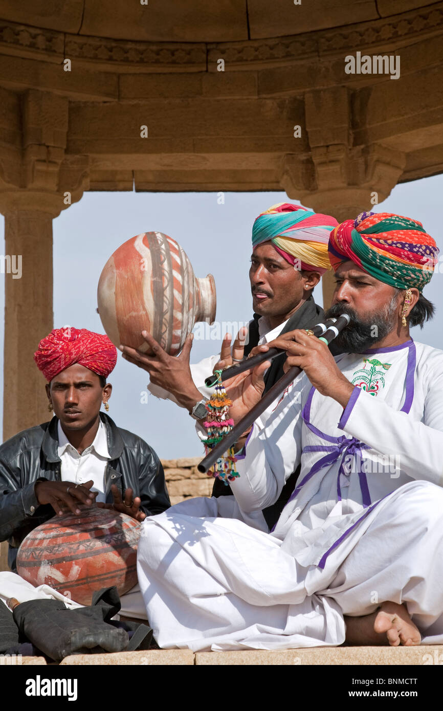 Indian musicians playing traditional music. Khuri village. Rajasthan ...