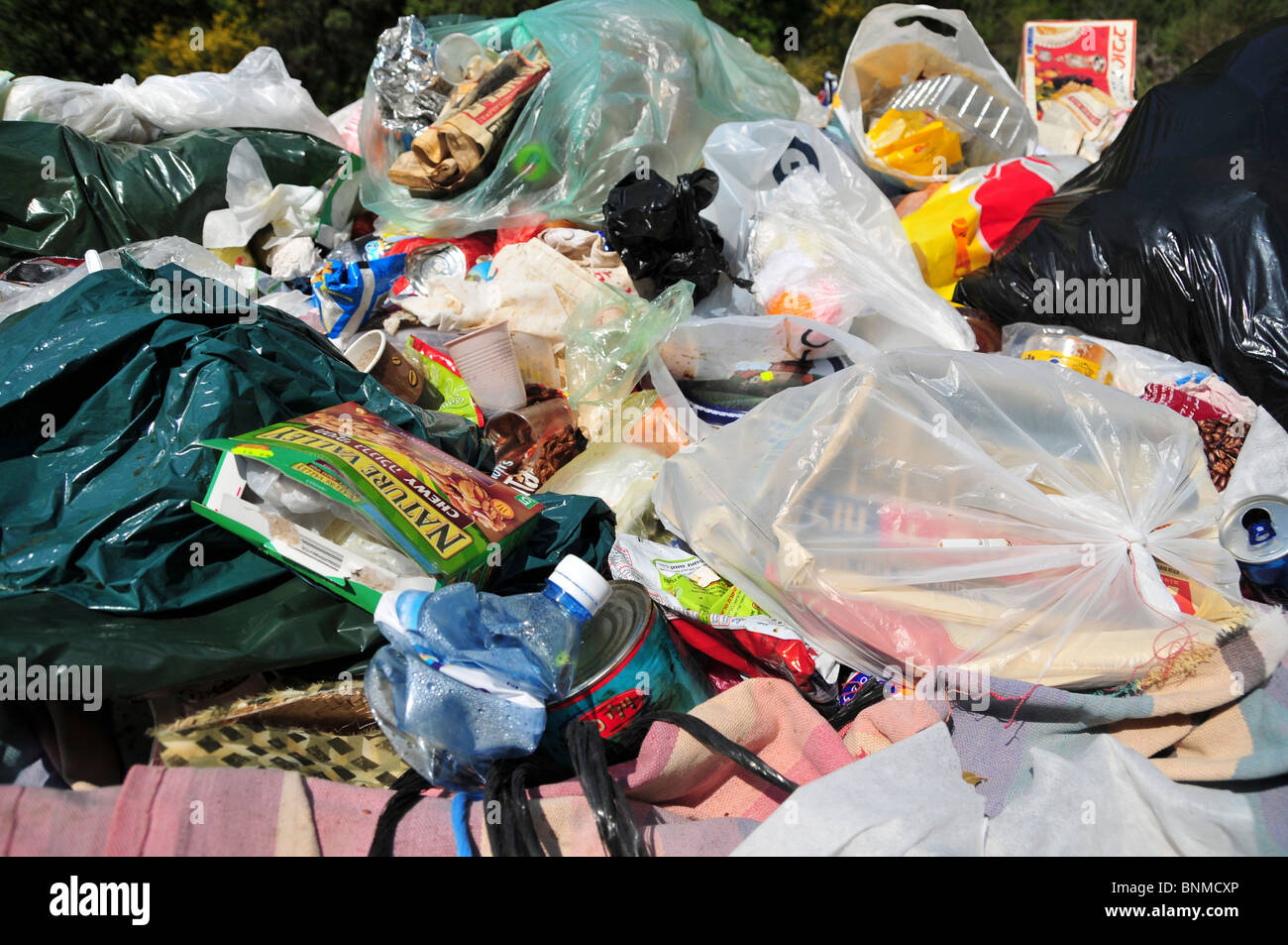 a pile of Plastic bags, Trash and garbage left by travellers and ...