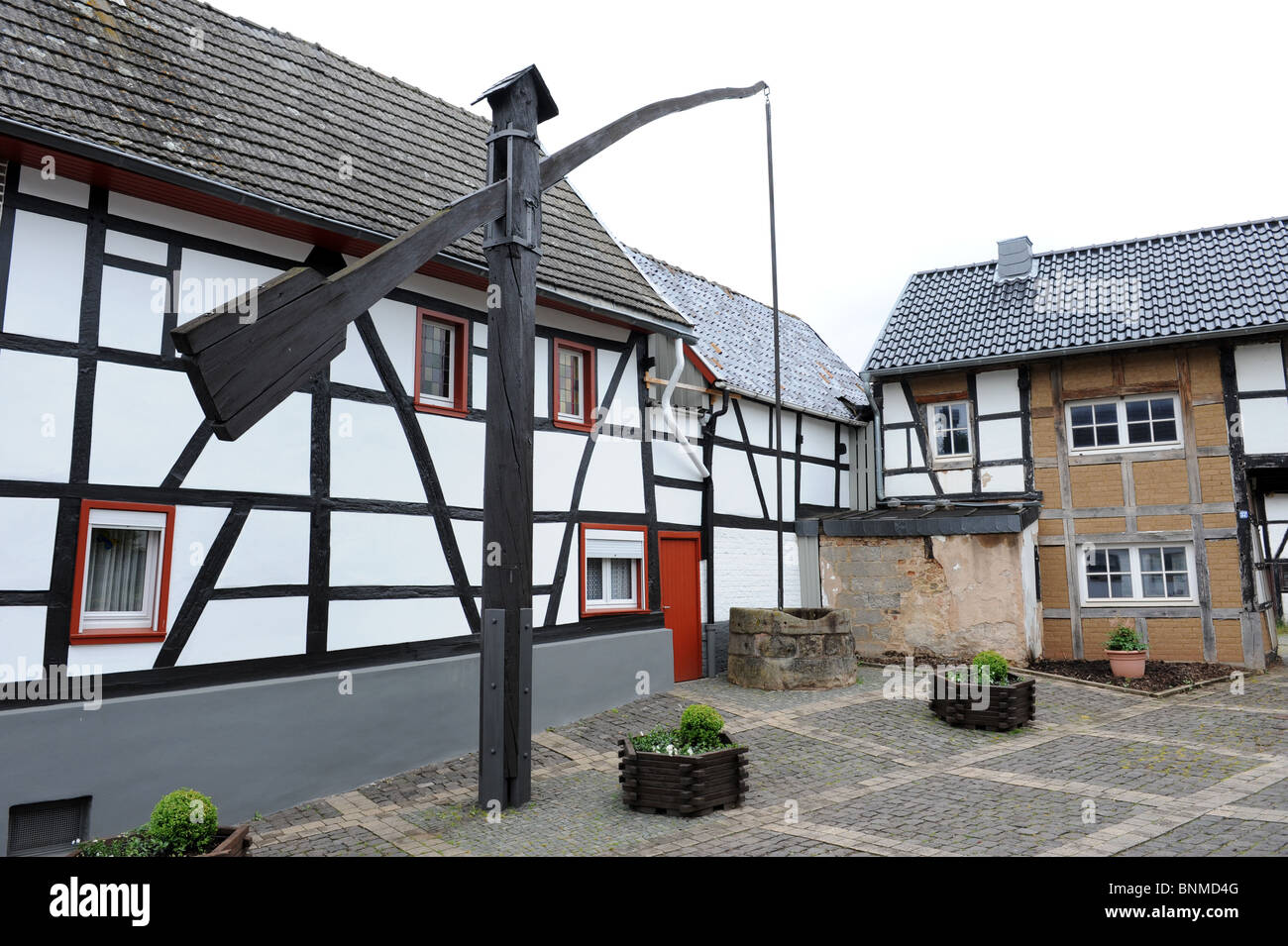 Old village water pump hi-res stock photography and images - Alamy