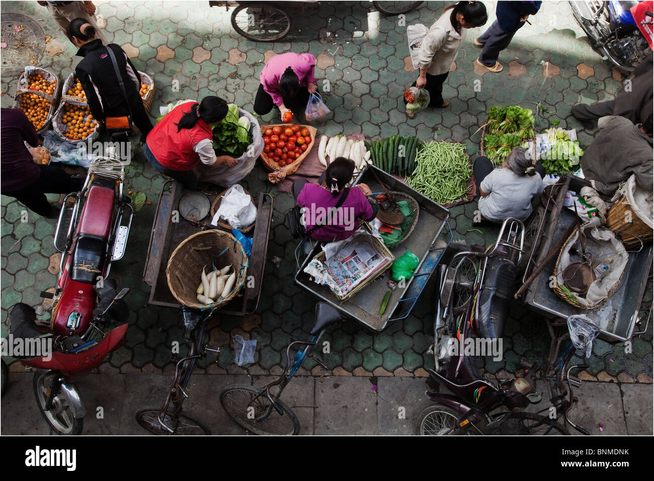 An elevated view of a farmer's market in China Stock Photo - Alamy