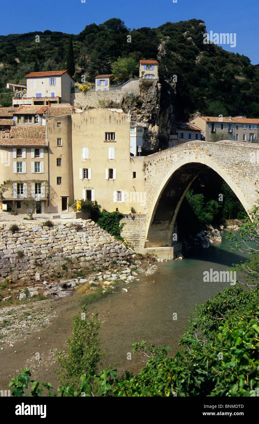 Nyons France Drôme town city houses homes river flow bridge arched ...