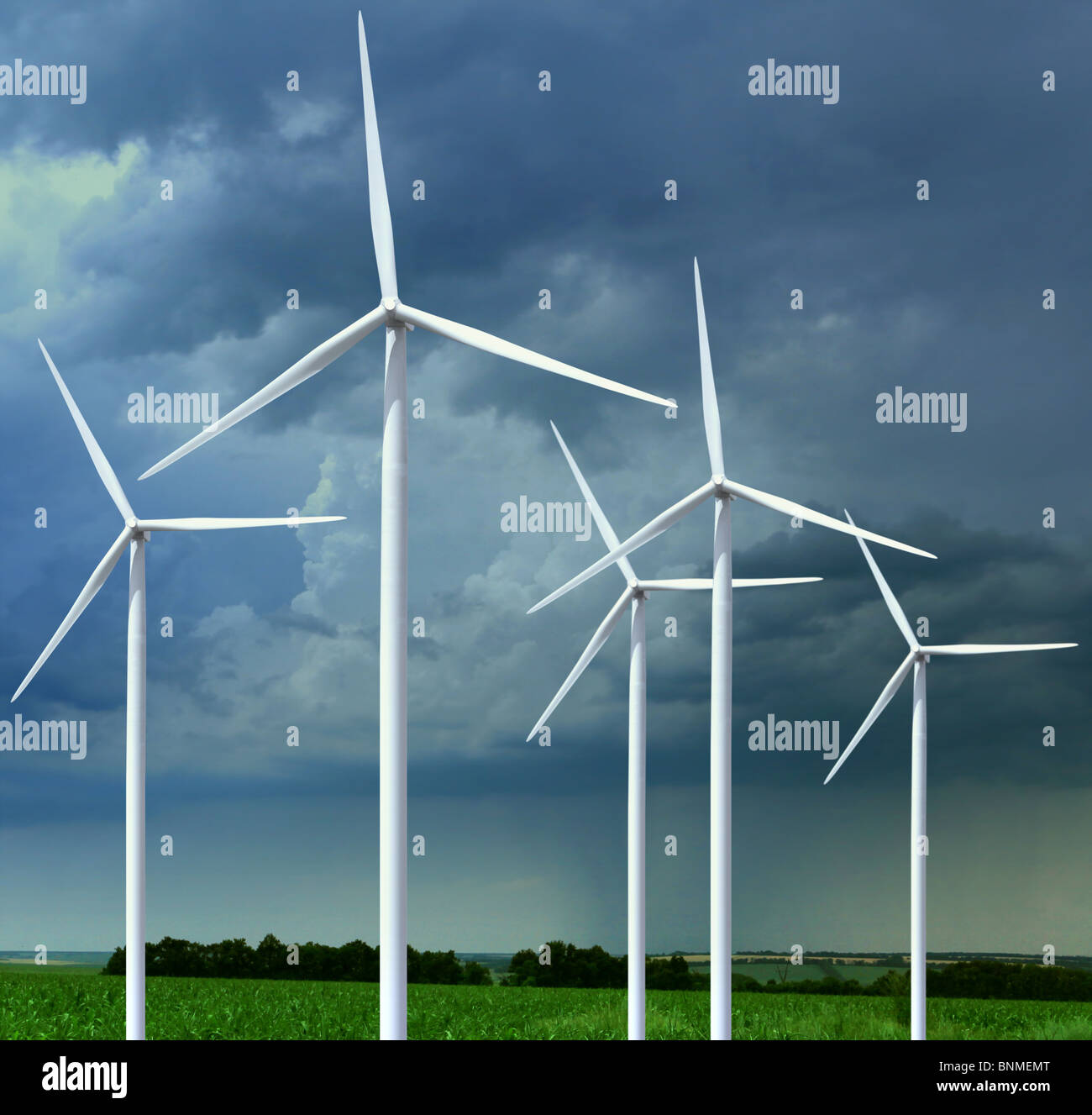 Beautiful green meadow with Wind turbines generating electricity Stock ...