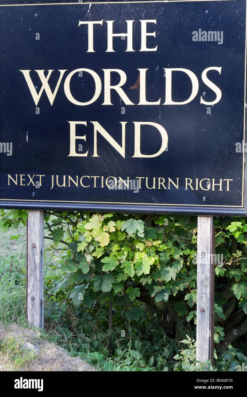 signpost to the world end next turn right - england Stock Photo - Alamy