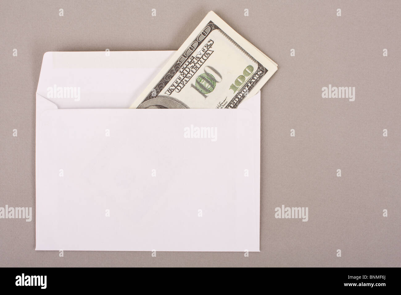 Hundred dollar bills in envelope hi-res stock photography and images ...