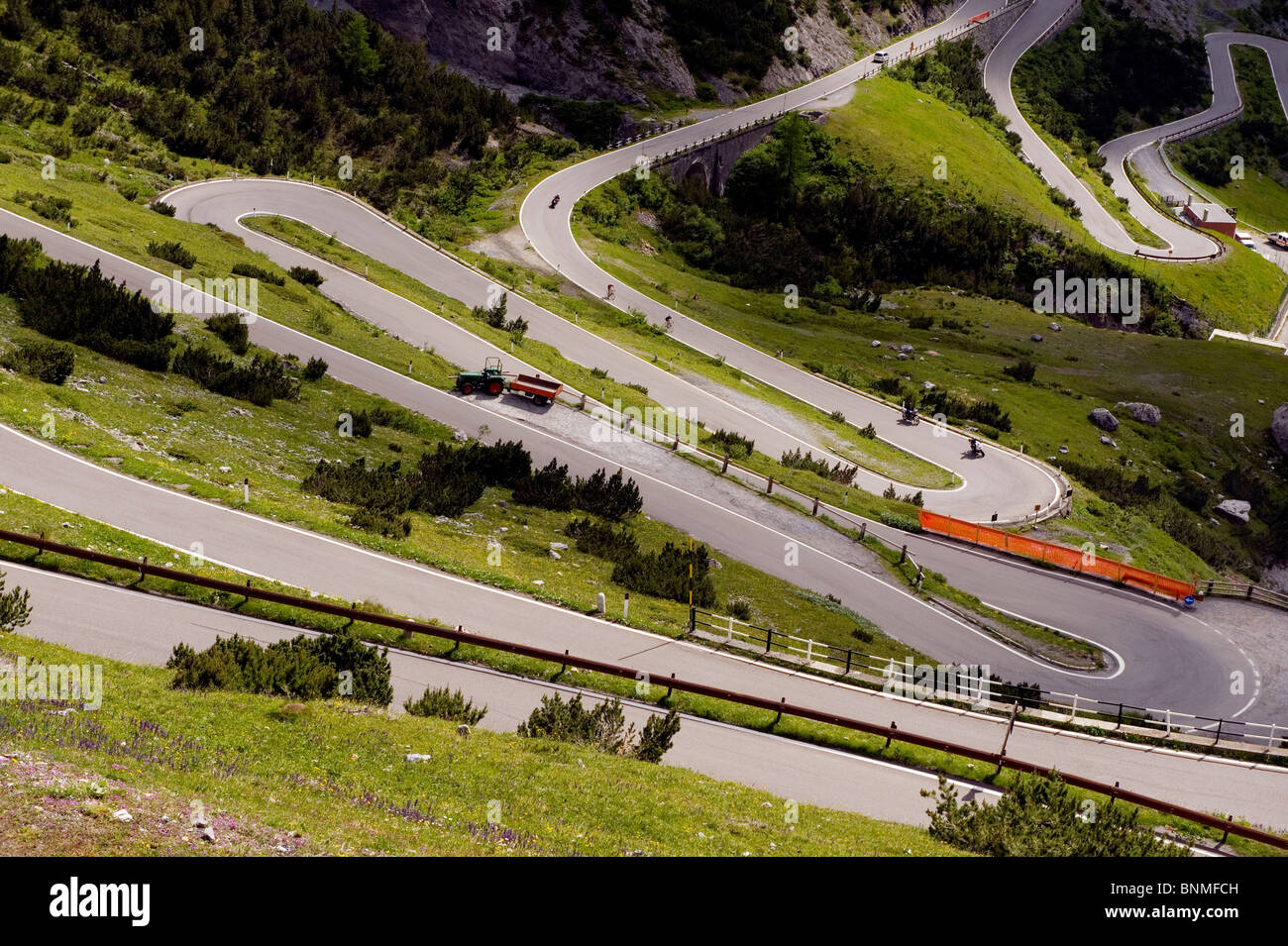 Italy. The Italian side of the Stelvio Pass going down to Bormio Stock ...