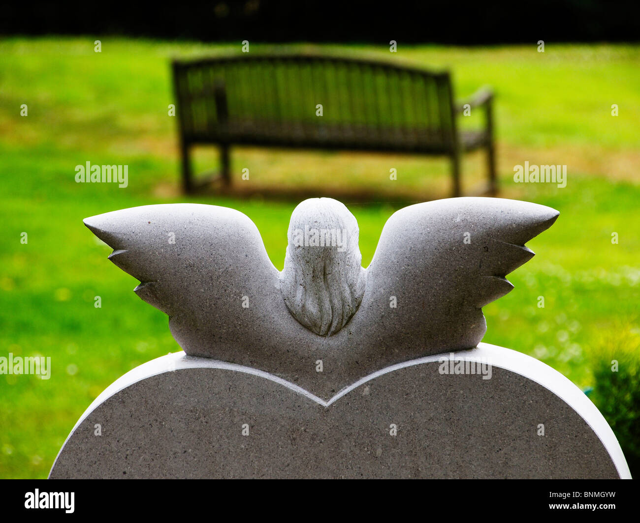 gravestones lit by the sun in a country cemetery Stock Photo - Alamy