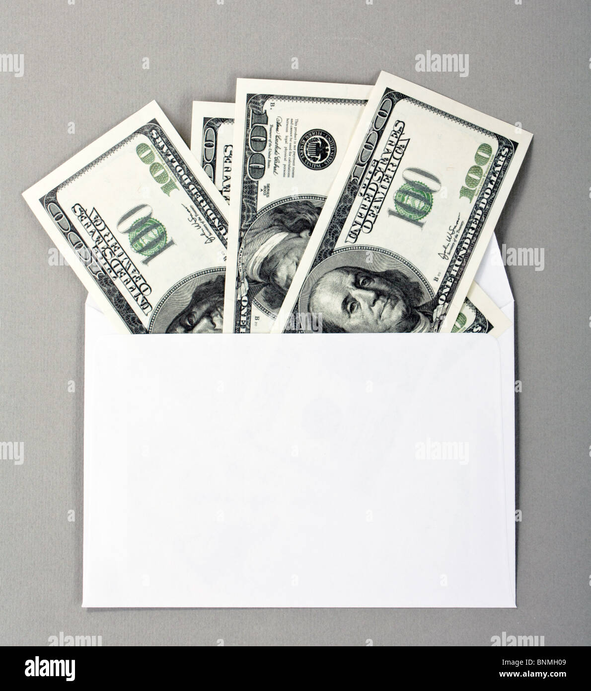 Us dollar bills in envelope hi-res stock photography and images - Alamy