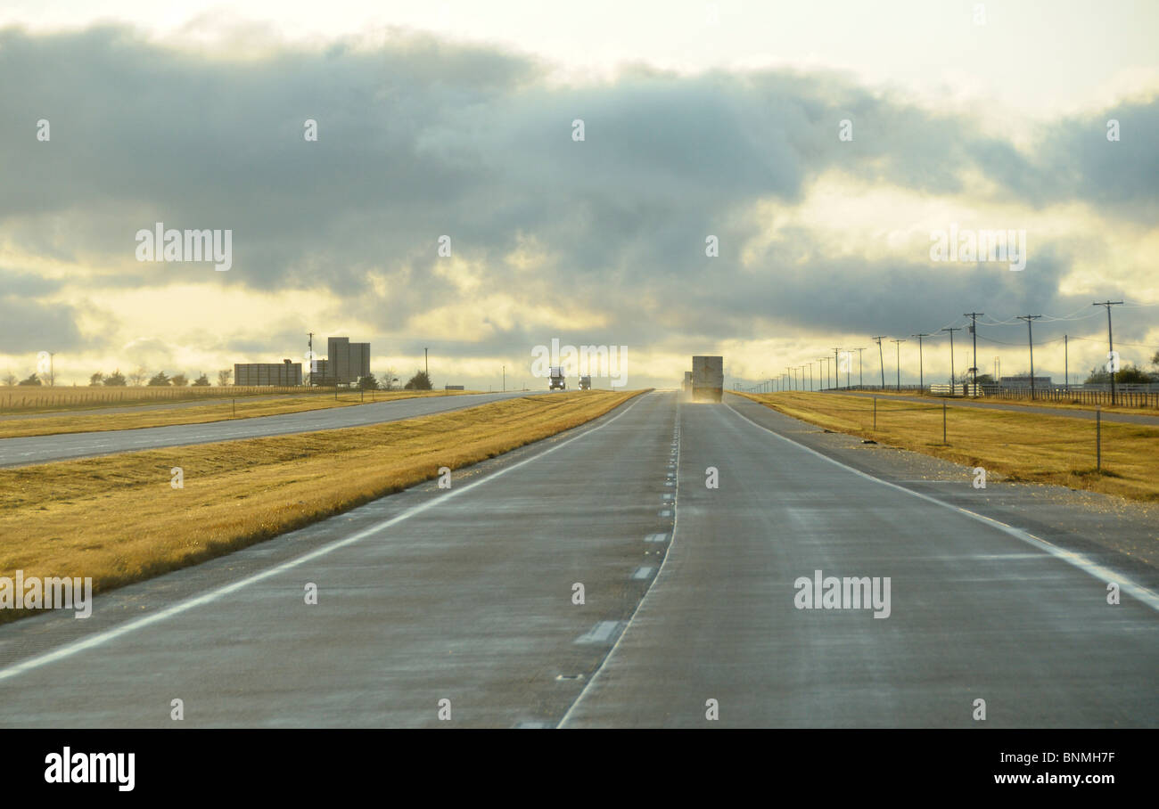 Storm driving trucks Highway I-40 route near Groom perspective dark ...