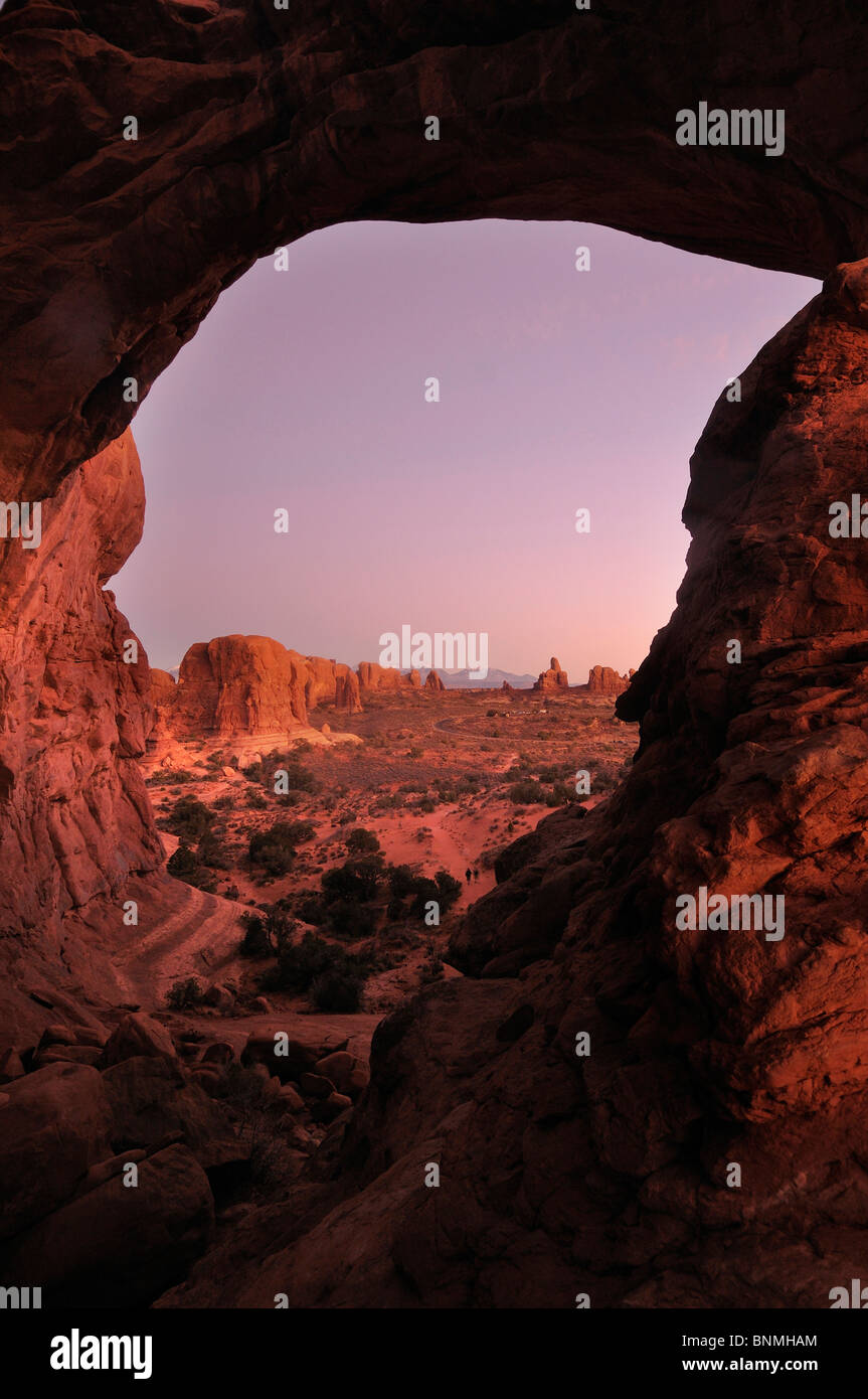Double Arch Windows Section sunlight dawn early morning rock formations ...