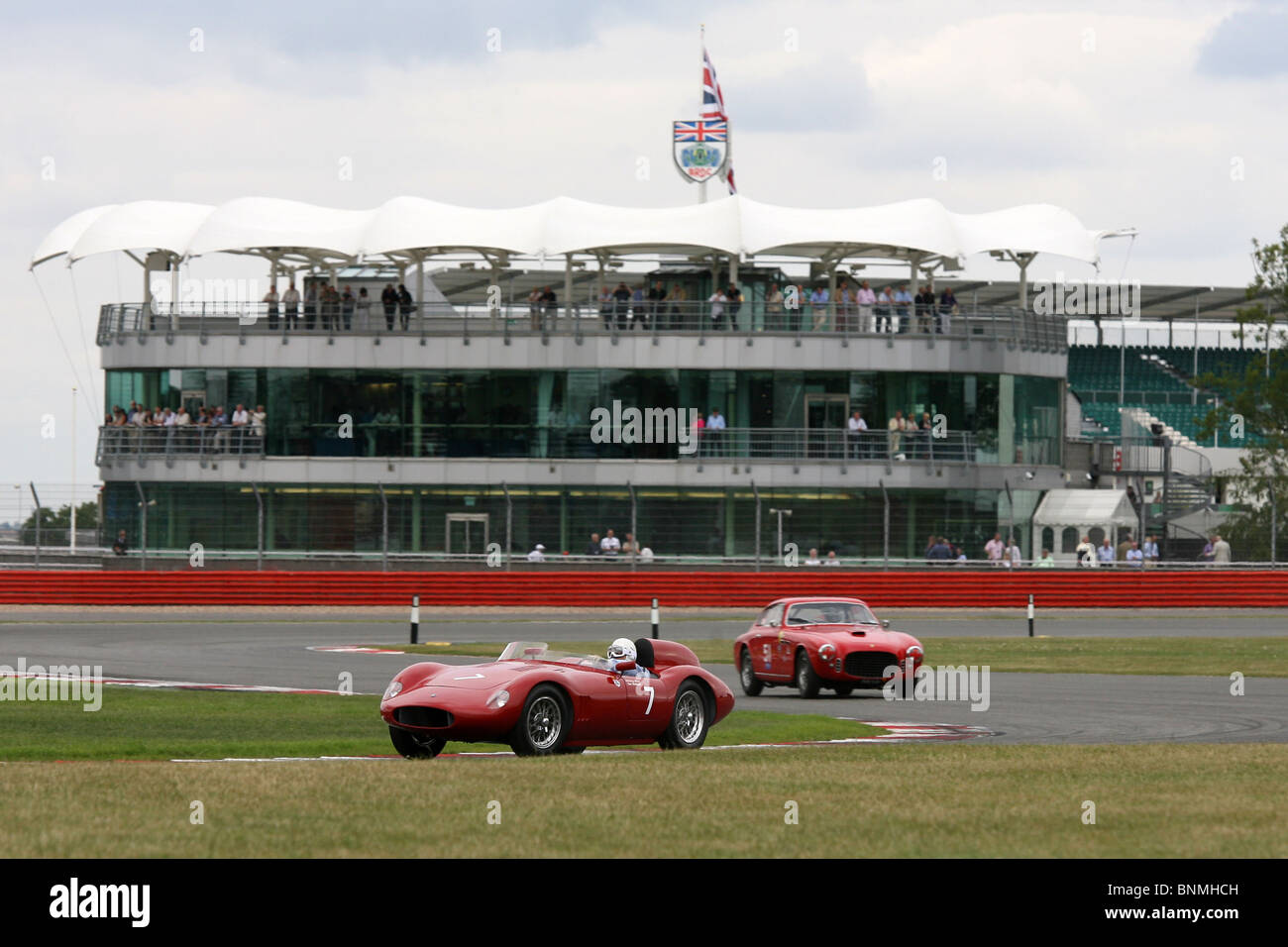 Sir Stirling Moss drives the OSCA during the Silverstone Classic ...