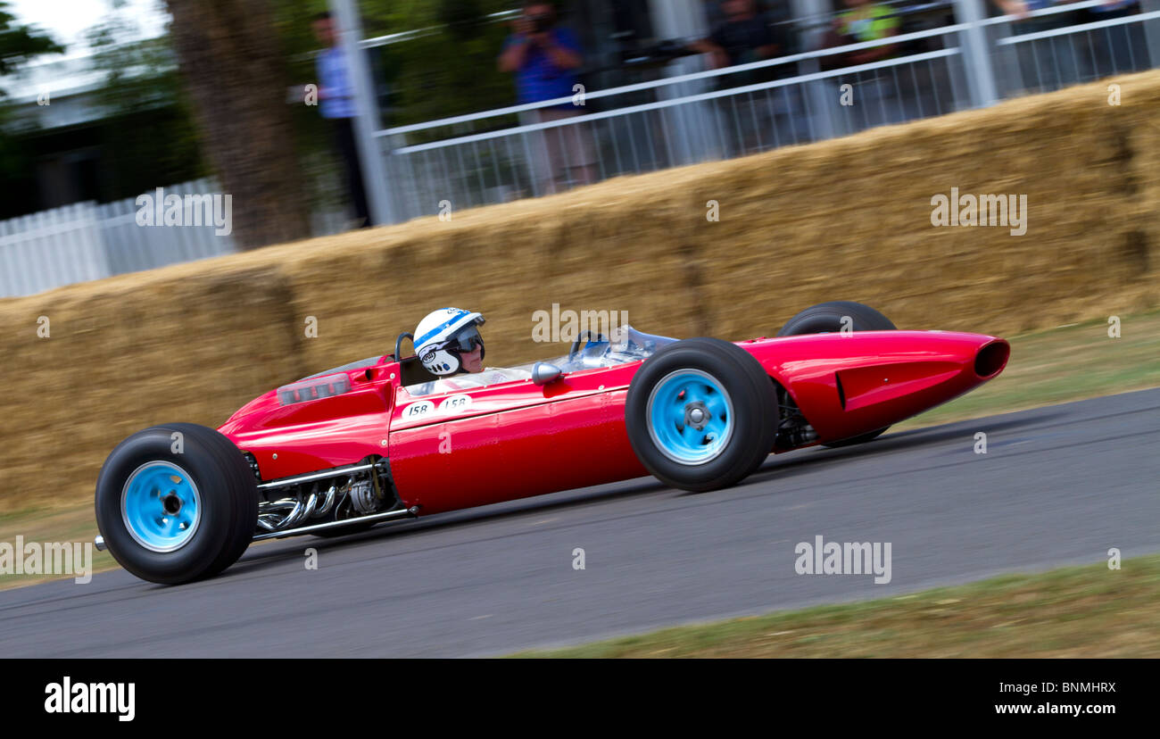 1966 Ferrari 158 with driver John Surtees at the 2010 Goodwood Festival ...