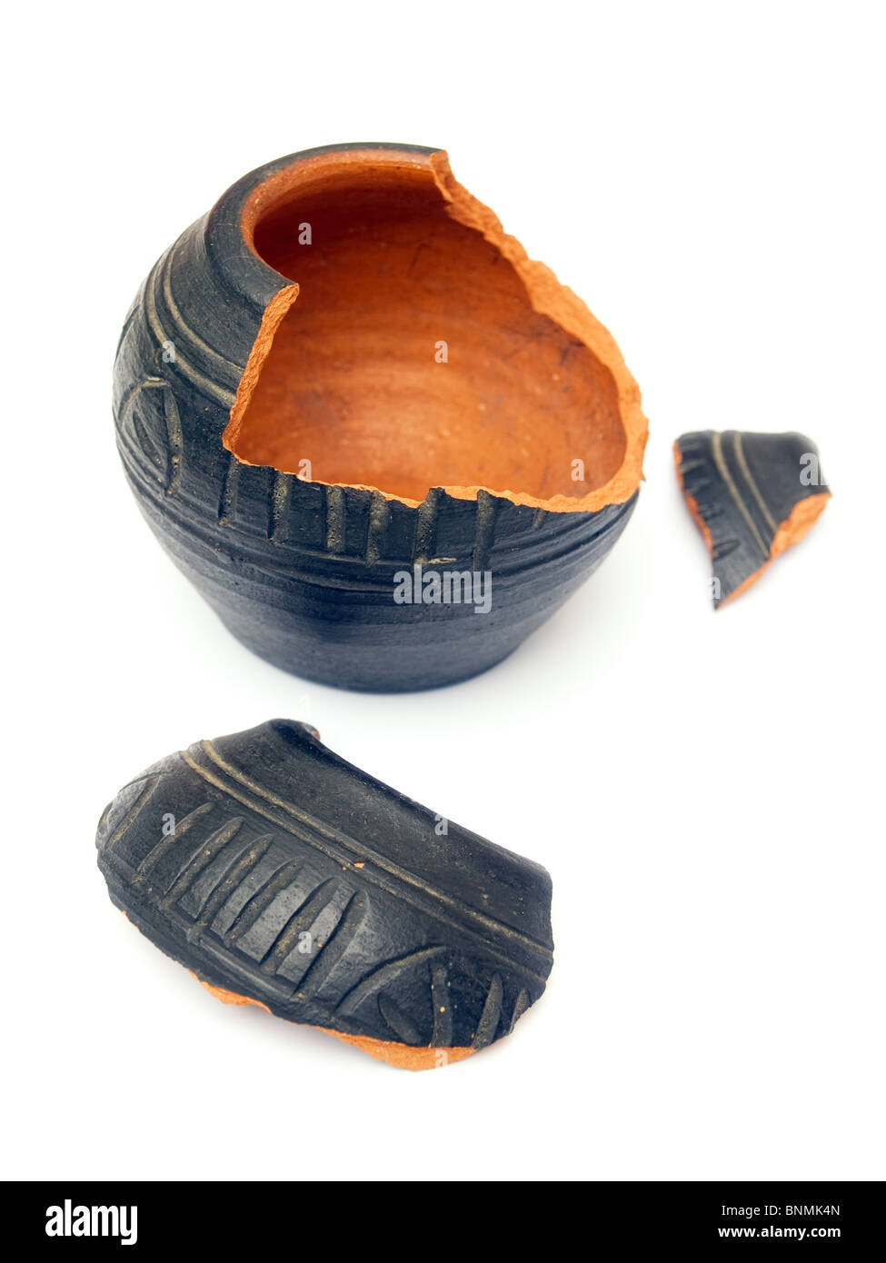 Old broken vase isolated on a white background Stock Photo - Alamy