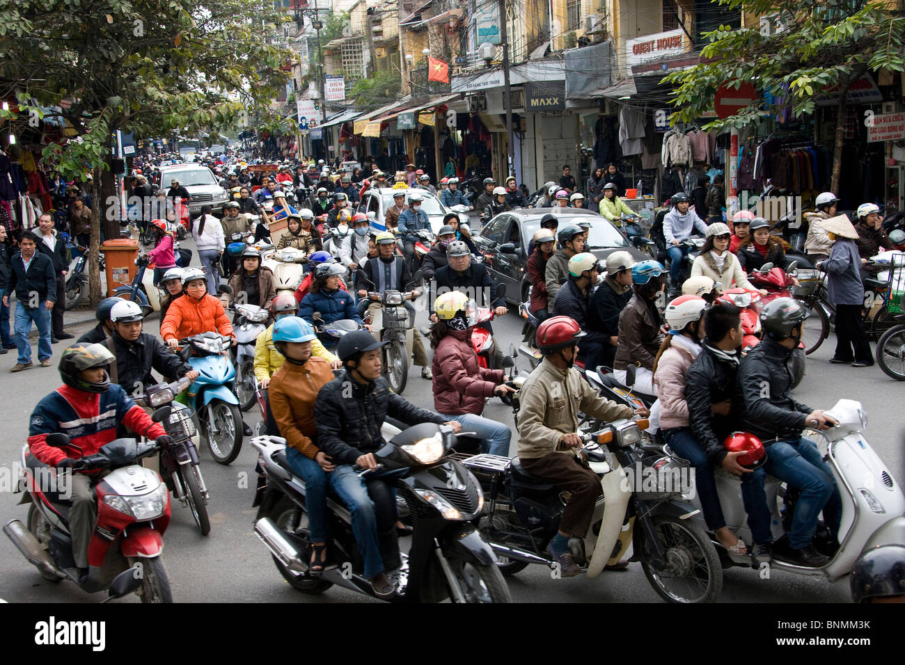 Vietnam Asia Far East Hanoi town city street traffic motorcycles ...